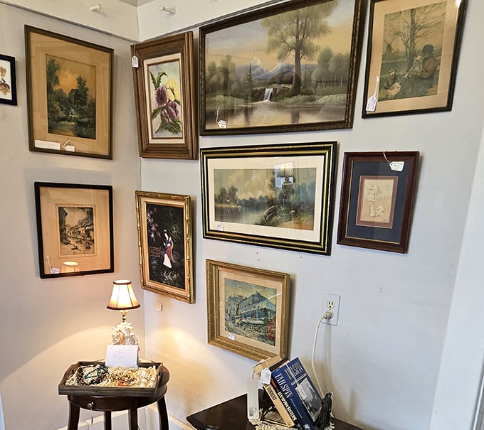 A gallery wall that's like Facebook for previous generations—carefully framed landscapes preserving memories of places that mattered.