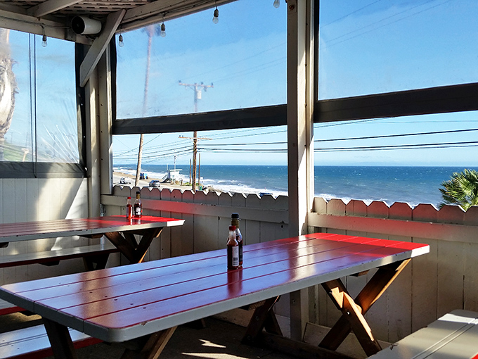 Window seats offer dinner and a show, watching the PCH parade while demolishing perfectly fried seafood.