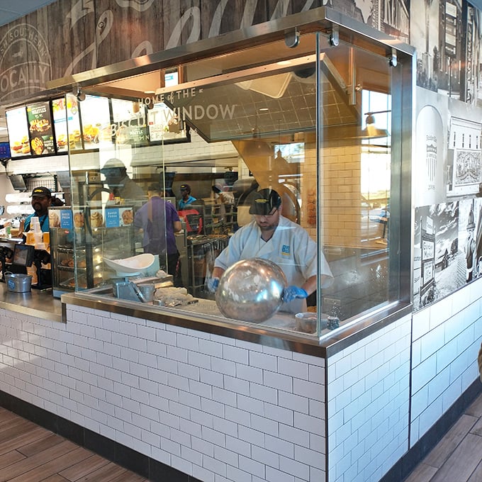 The "Biscuit Window" offers a front-row seat to the magic, where skilled hands transform simple ingredients into breakfast gold.