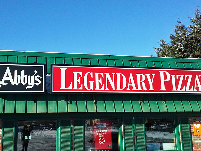 Abby's distinctive green roof signals you've arrived at pizza paradise—where "legendary" isn't just marketing speak.