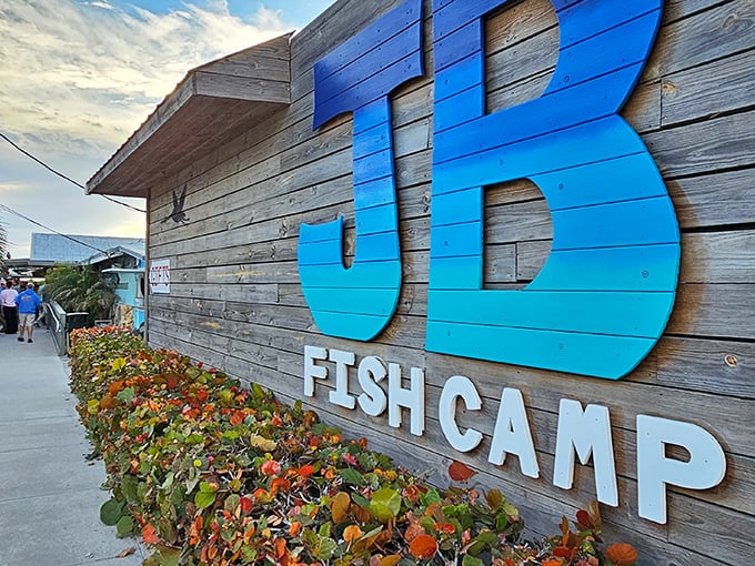 JB's weathered wood exterior promises exactly what it delivers – authentic Florida fish camp vibes.