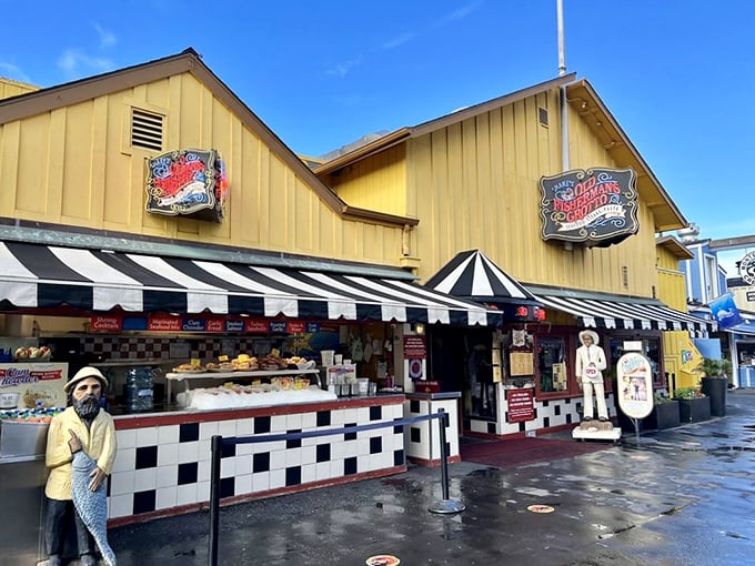 That classic yellow building and checkered awning scream "old-school seafood shack" in the most delightful way possible. 