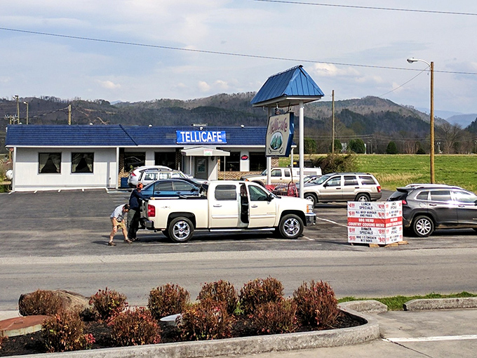 The Tellicafe's iconic blue roof signals comfort food ahead—a beacon for hungry travelers exploring Tennessee's mountain playground.