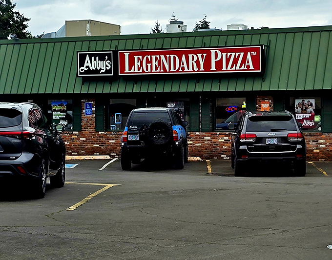 That classic brick facade houses generations of pizza memories—where Oregon families have been saying "just one more slice" for decades.