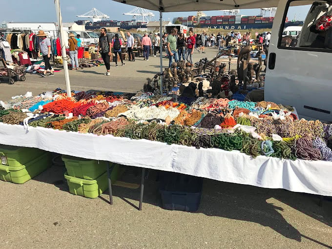 Waterfront browsing at its finest – where else can you shop for treasures with container ships as backdrop?