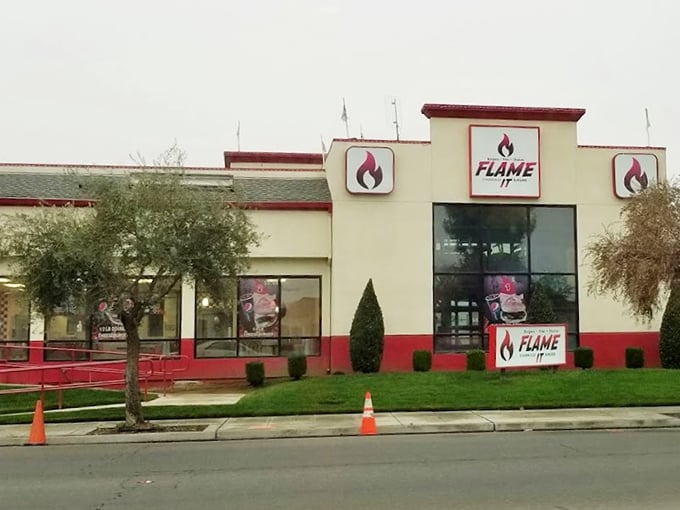 This unassuming building houses flame-grilled magic – where Fresno locals find burger satisfaction without pretense or fuss.