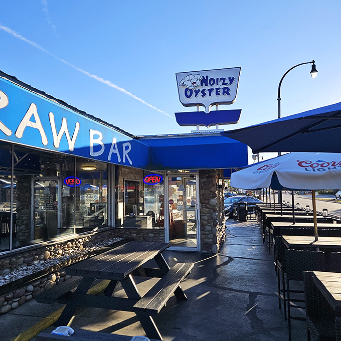 That bright blue facade isn't trying to hide anything – it's proudly announcing where great pizza and good times collide.