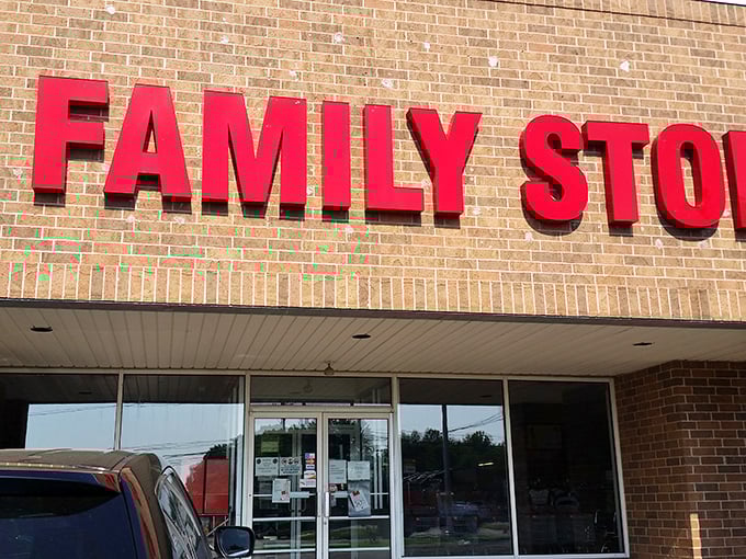 Close-up of the bold red FAMILY STORE lettering that promises bargains for everyone. Generations of thrifters have walked through these doors!