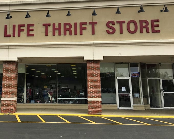 The wide windows of Good Life Thrift Store offer a glimpse into a world where one person's castoffs become another's treasures.