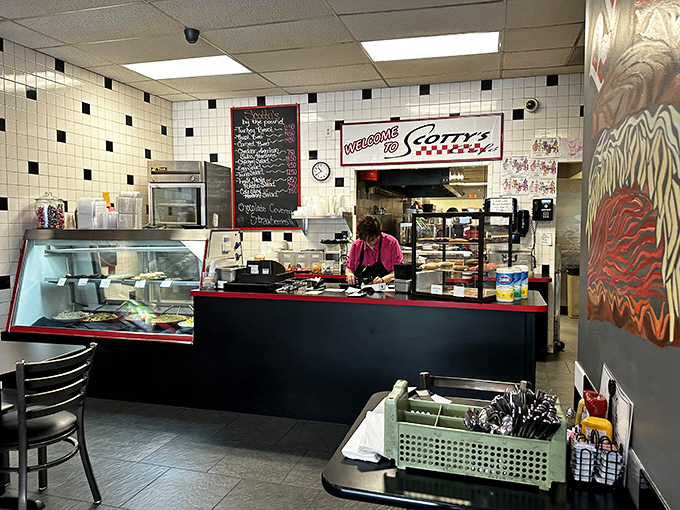 Clean lines, pendant lighting, and tables ready for the next wave of hungry patrons—simplicity that lets the food take center stage.
