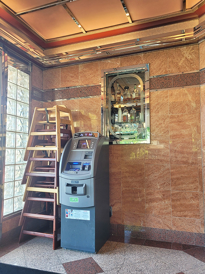 Even the ATM looks like it belongs in a diner museum, standing guard next to a ladder that surely leads to secret breakfast treasures.