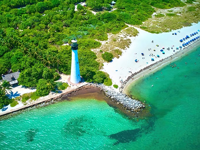 From above, the lighthouse appears as if it's dipping its toes into waters so clear and green they seem almost computer-enhanced—but this is pure Florida magic.