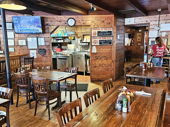 Wood paneling, sturdy tables, and the lingering aroma of oak smoke – barbecue ambiance doesn't get more authentic than this.
