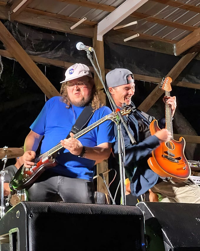 Live music under rustic rafters – where local musicians transform ordinary evenings into the kind of memories that linger long after vacation ends.