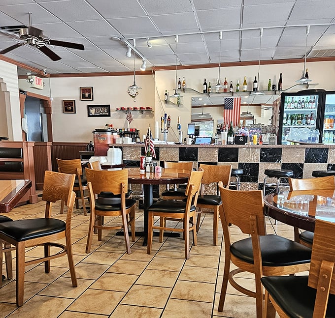 The bar area offers a different kind of communion—where solo diners find community and nobody raises an eyebrow at breakfast-for-dinner.