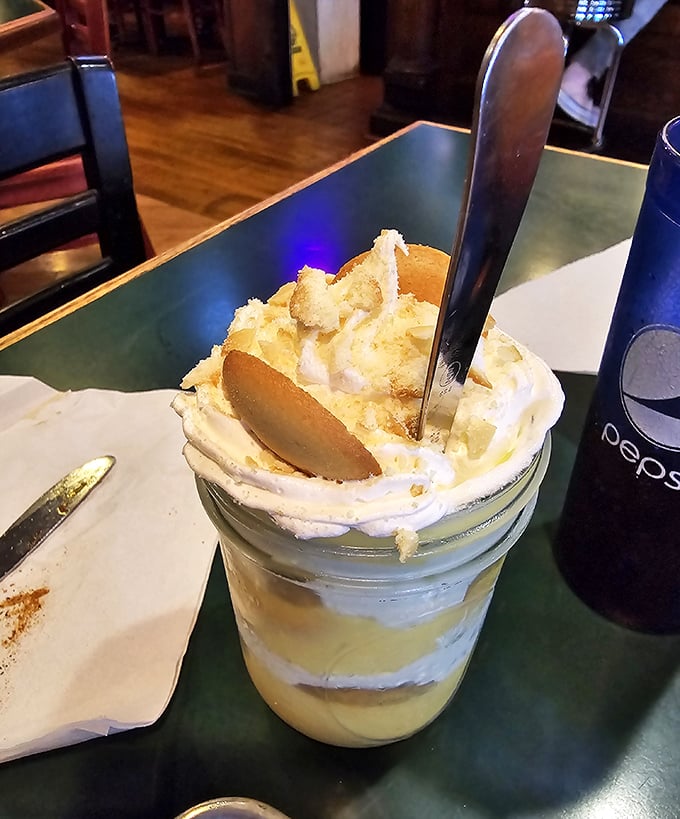 Banana pudding served in a jar—because when dessert is this good, you need to see exactly what you're getting into.