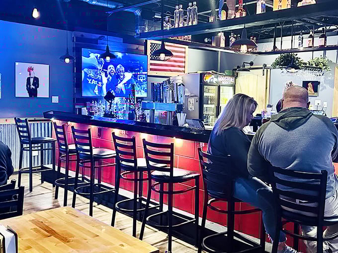 The bar area—where regulars have their unofficial assigned seats and newcomers quickly understand why this place inspires such loyalty.