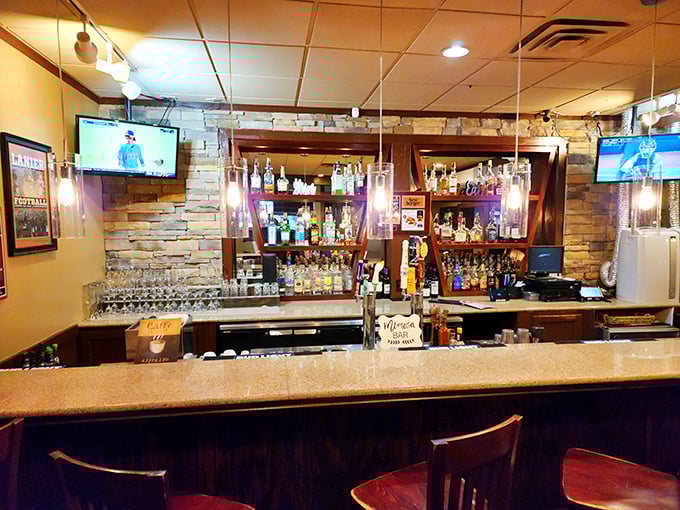 The well-stocked bar stands ready for those who believe a good meal deserves a proper toast or a relaxing nightcap.