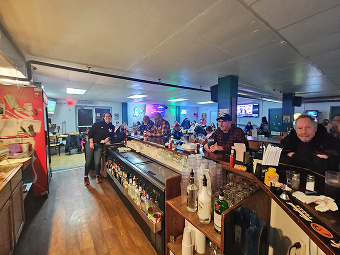 Behind every great bar is a lineup of bottles and a bartender who remembers your usual. The heart of The Backroom's social scene.