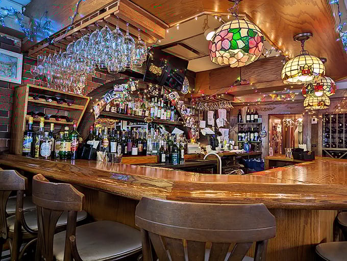 A bar that Sinatra would approve of—warm wood, twinkling lights, and enough spirits to lift yours after any kind of day.