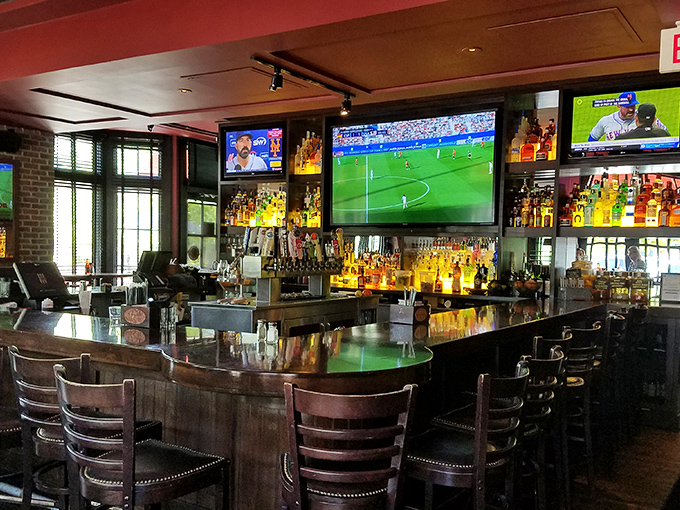 A bar that beckons with amber bottles and multiple screens—because sometimes you need sports with your spirits. The perfect perch for solo diners.