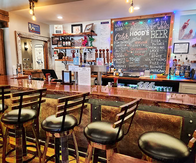 The chalkboard behind the bar doesn't just list drinks—it maps out your evening's possibilities, from local ciders to craft cocktails.