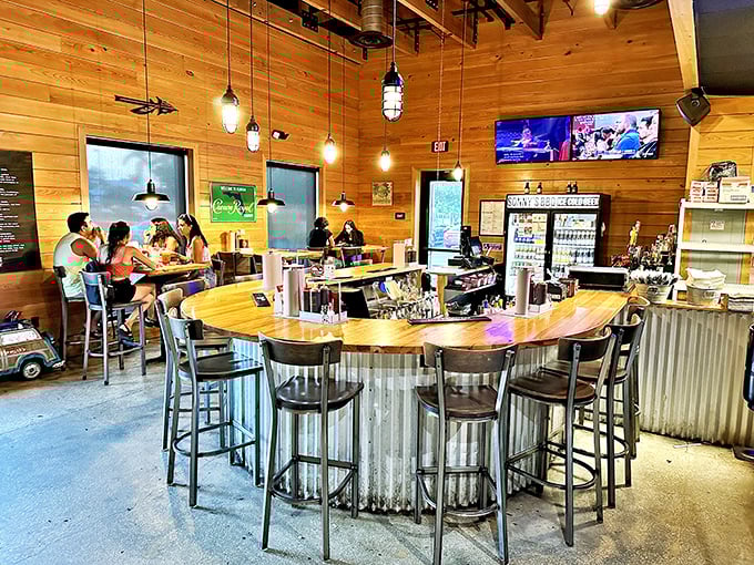 The bar area: where decisions about sauce selection are made with the gravity they deserve. Wood and metal creating the perfect BBQ backdrop.