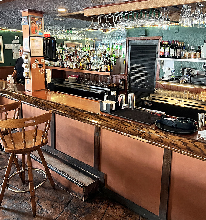 A bar that says "pull up a stool and tell me your fishing stories." Wood paneling and well-stocked shelves promise good times and better drinks.