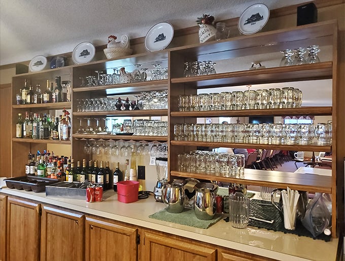 A bar that means business with its impressive lineup of glassware. This isn't just where drinks are made—it's where conversations flow as freely as the beverages.
