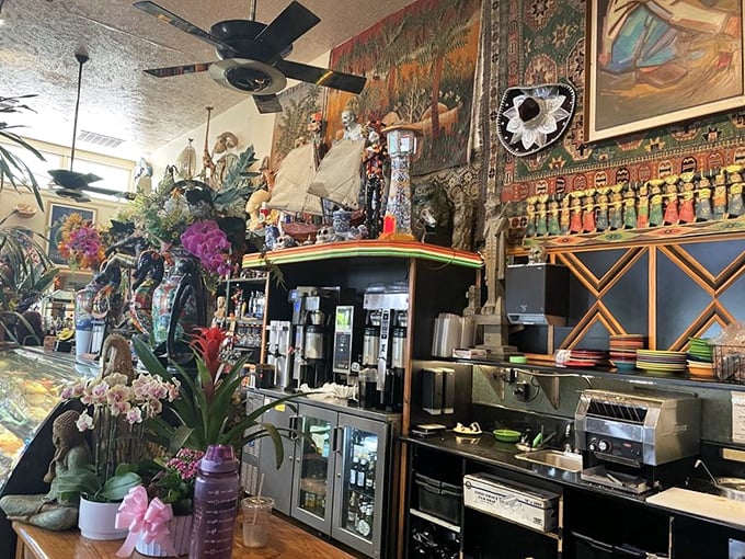The bar area looks like Indiana Jones retired to open a café, with artifacts and treasures from global adventures creating a museum-worthy backdrop.
