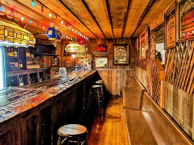 The bar area preserves the establishment's stagecoach stop origins. If these walls could talk, they'd probably order another round.