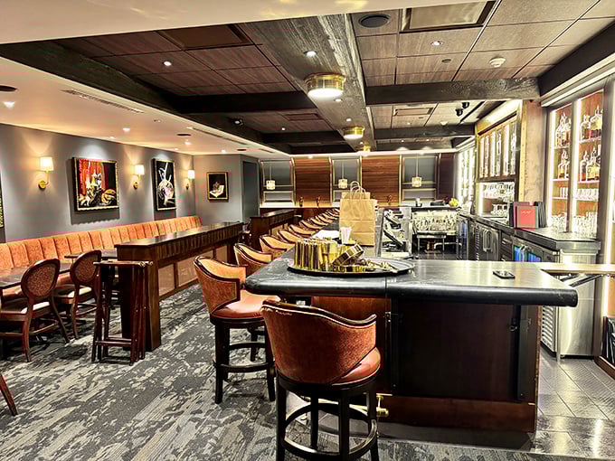 The bar area – where leather meets marble in a sophisticated dance. A place Don Draper would approve of for closing his biggest deals.