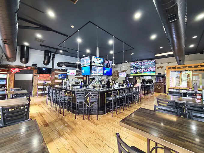 The bar area—where sports fans gather like ancient Romans at the Colosseum, except with better drinks and fewer lions.