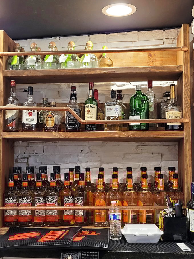 A bar stocked with liquid sunshine. Those tequila bottles aren't just inventory—they're promises of good times waiting to happen.