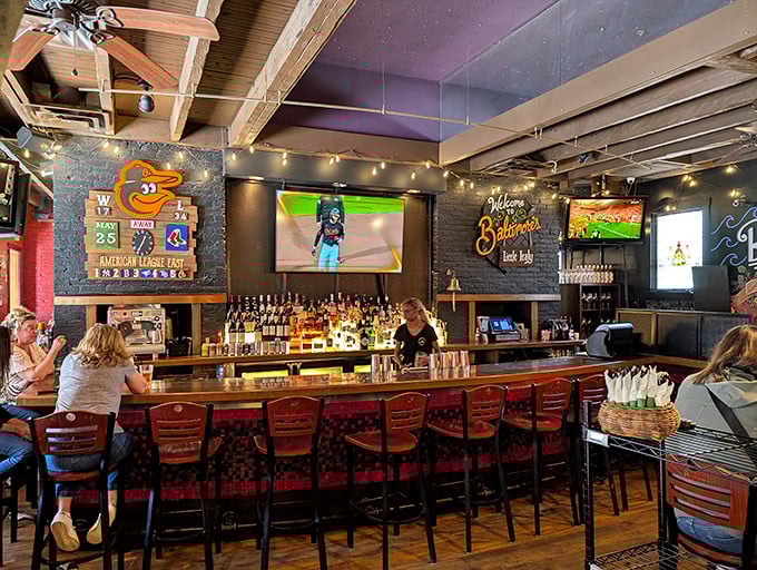 The welcoming bar area where skilled bartenders craft cocktails that perfectly complement your Italian feast.