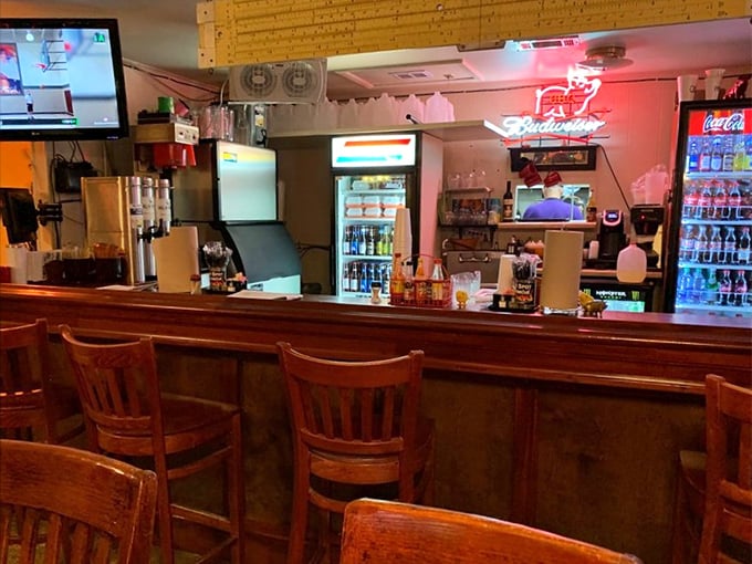 The bar area glows with that welcoming "you've earned this beer" ambiance that makes every barbecue outing feel like a celebration.