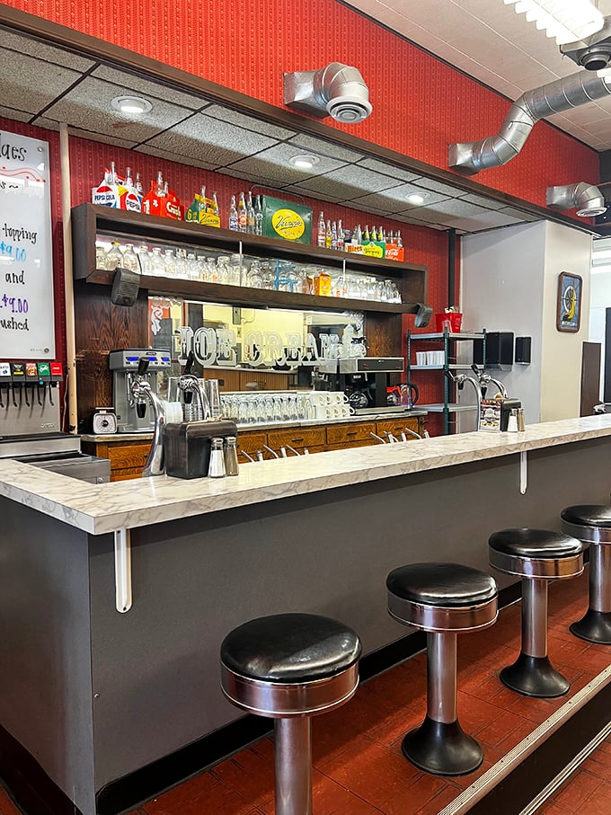 This isn't just a soda fountain counter—it's a stage where milkshake magic happens daily, complete with those perfect spinning stools.