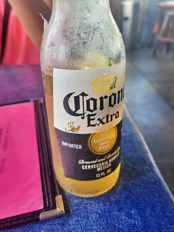 A Corona so perfectly chilled, the bottle sweats more than a tourist who forgot sunscreen on Sanibel's beaches.