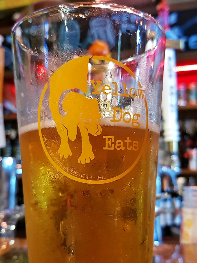 Their branded glassware holds liquid gold that pairs perfectly with smoky meats. This beer isn't just a beverage—it's an essential component of the Yellow Dog experience.
