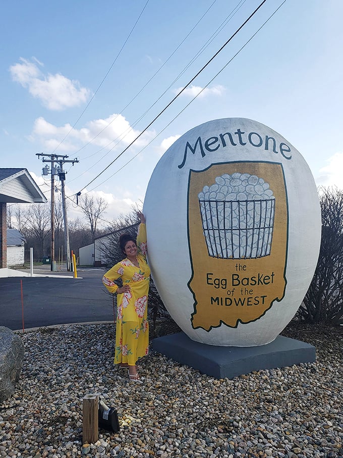 The egg provides perfect perspective on human scale – we're all just tiny breakfast enthusiasts in comparison to this monument.