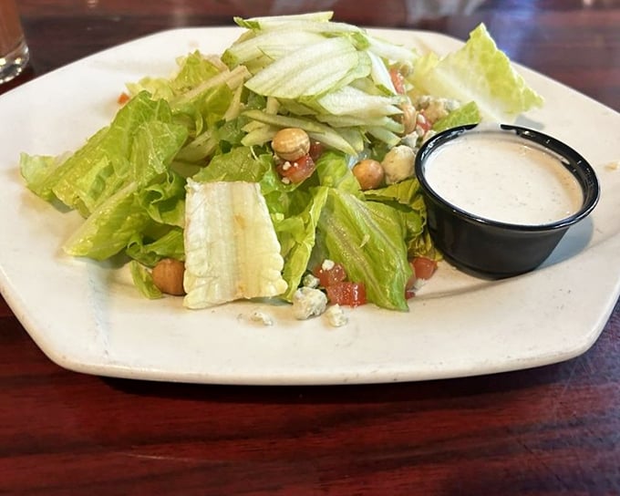 This isn't just any salad—it's a carefully orchestrated symphony of crisp greens, tangy blue cheese, and crunchy chickpeas that makes vegetables exciting again.