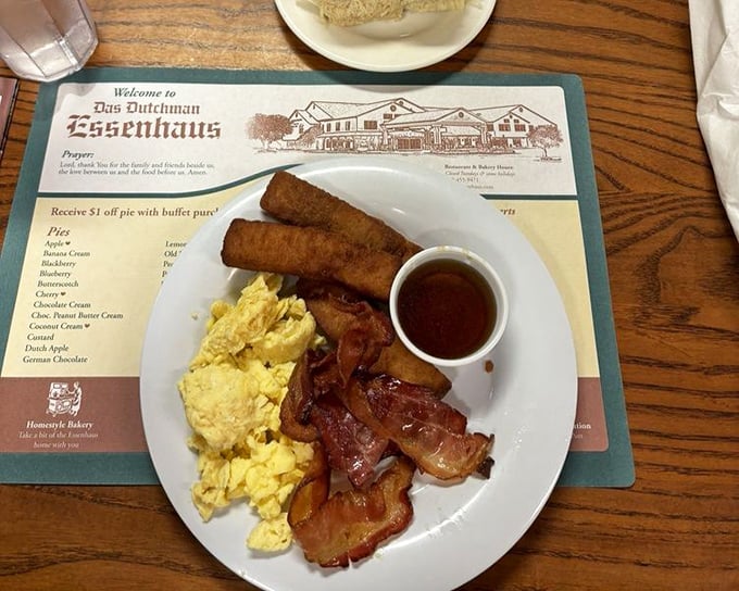 Breakfast that would make your grandmother proud—scrambled eggs, bacon, and sausage links that put hotel buffets to eternal shame.