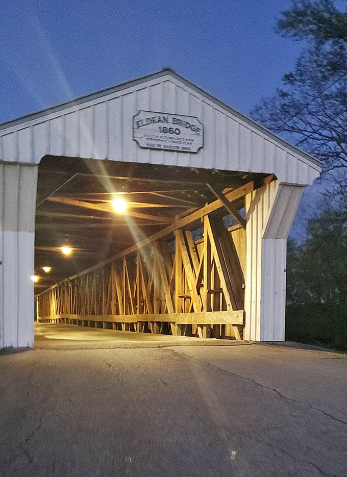 Night brings a whole new personality to the bridge, with warm lighting illuminating the wooden skeleton that's held strong for generations.