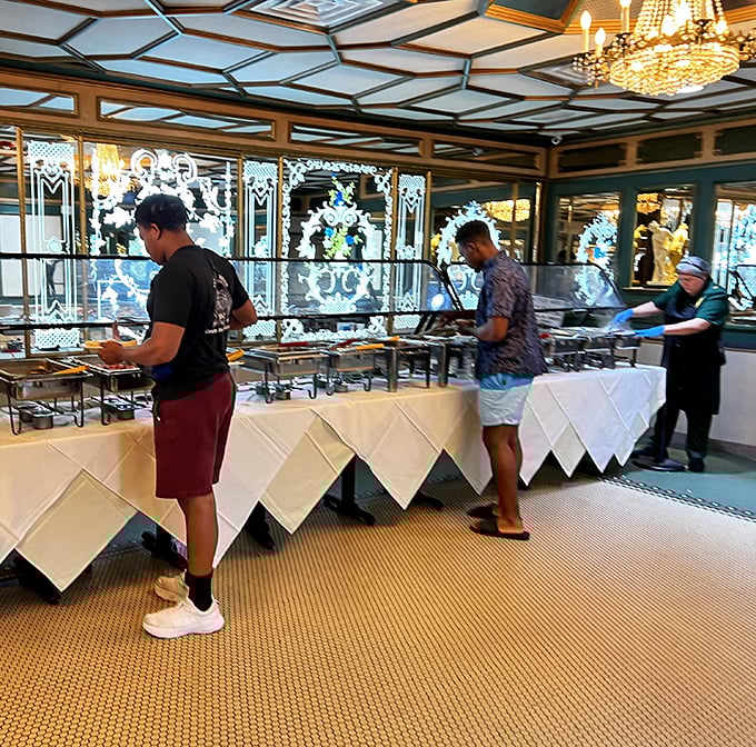 The buffet line where patience is rewarded with platters of Cuban classics – a test of willpower for the indecisive food lover.