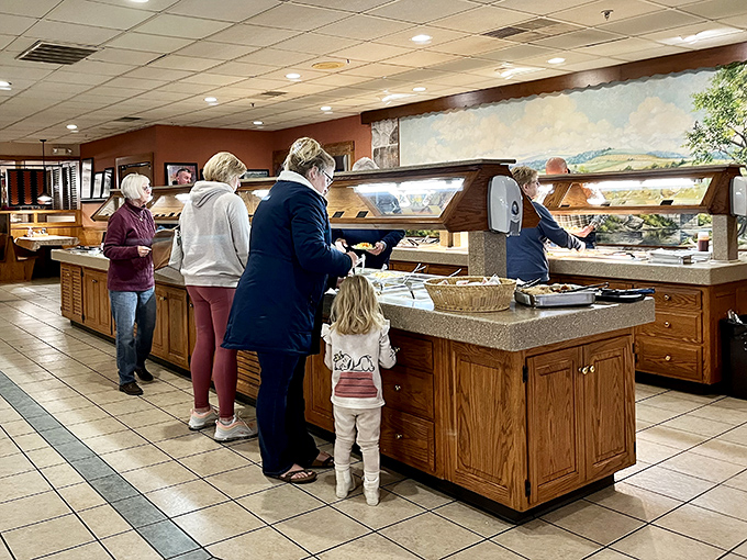 The buffet line—where self-control goes to die and "I'll just try a little of everything" becomes the day's biggest fib.