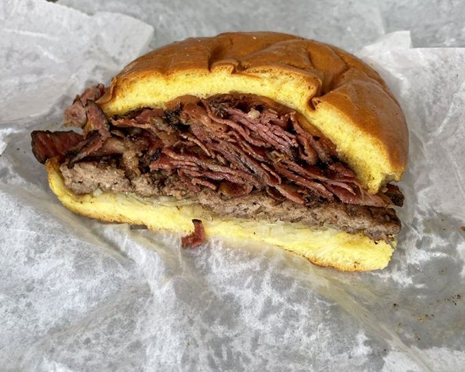 This isn't just a burger; it's a beautiful rebellion against predictability. The pastrami addition transforms an American classic into something transcendent.