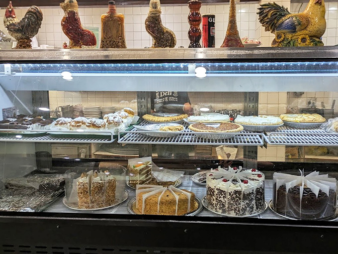 The dessert case – where willpower goes to die and "I'll just have a bite of yours" becomes the biggest lie of the day.
