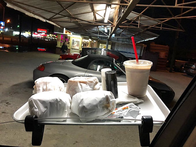 The classic carhop service tray—hooked to your window like it's 1955. Some traditions deserve preservation, especially when they involve cheeseburgers.