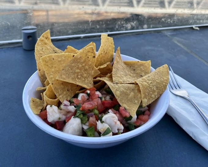 Ceviche and chips—the sophisticated cousin of nachos that went to culinary school and came back with stories to tell.