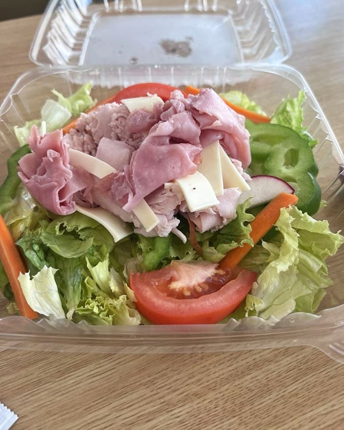 This chef salad proves even leafy greens deserve respect—loaded with quality meats and cheese for those pretending to make healthy choices.